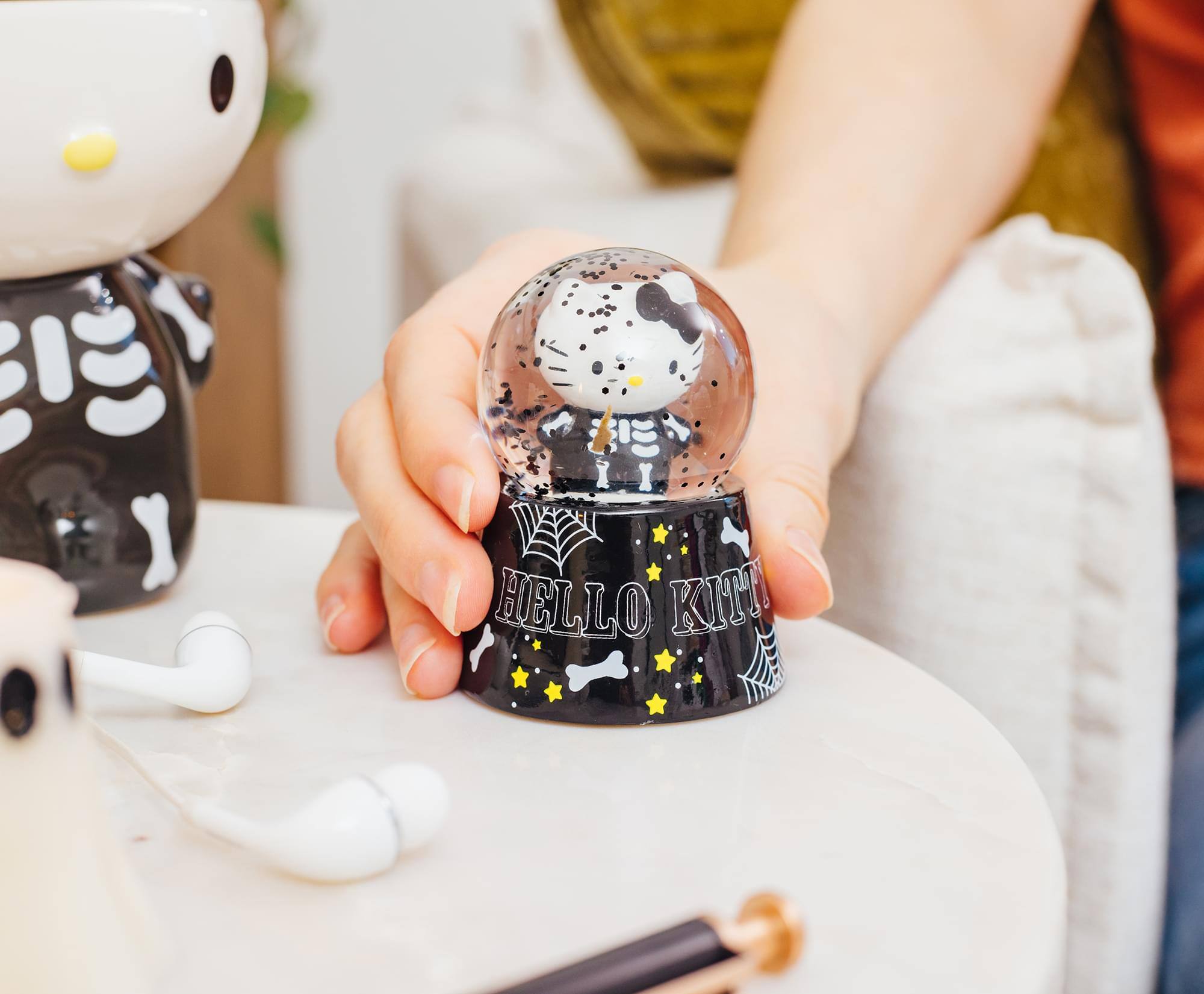 Silver Buffalo Sanrio Hello Kitty Black Skeleton Mini Light Up Snow ...