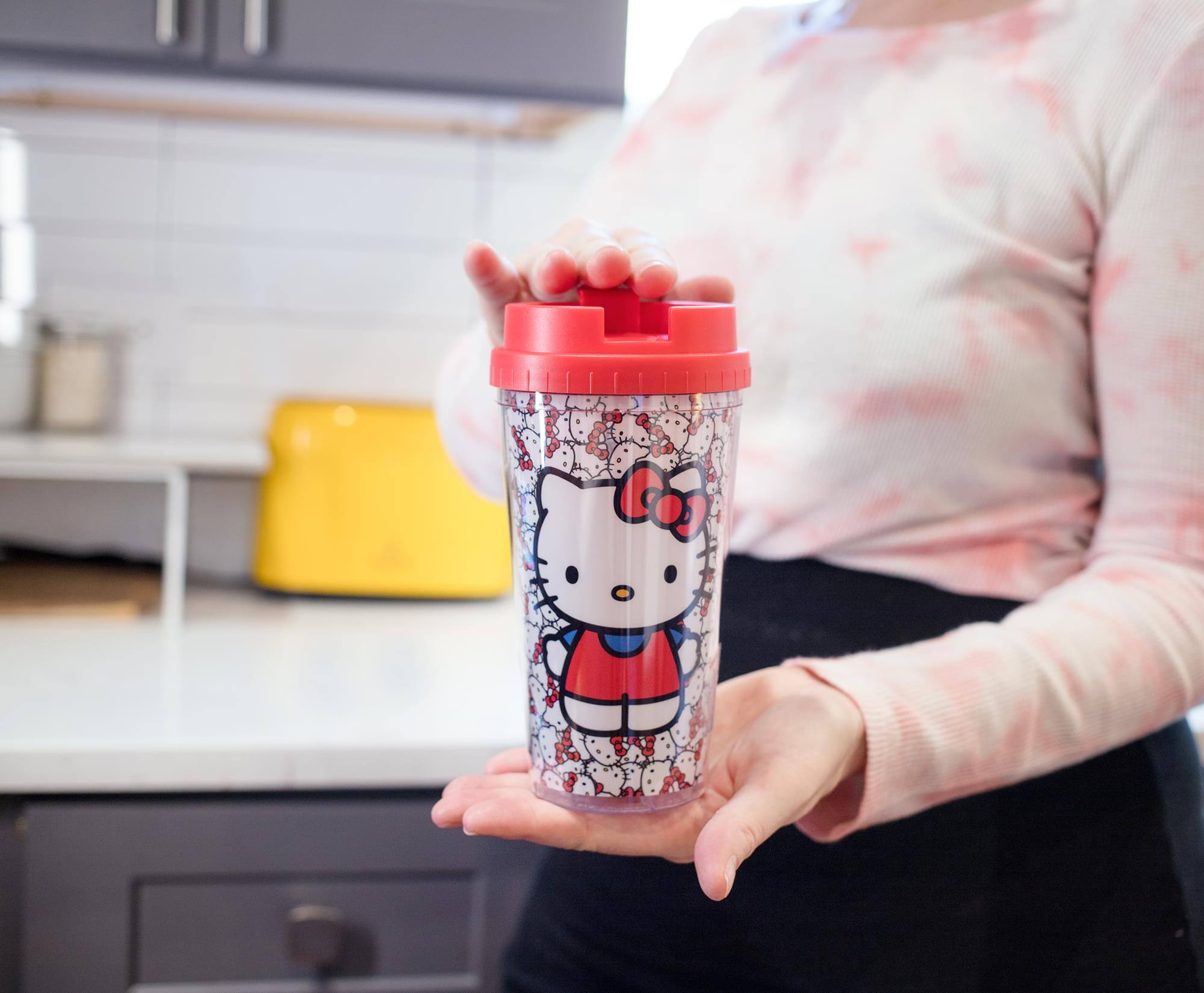 Silver Buffalo Sanrio Hello Kitty Allover Faces Plastic Travel Mug With ...