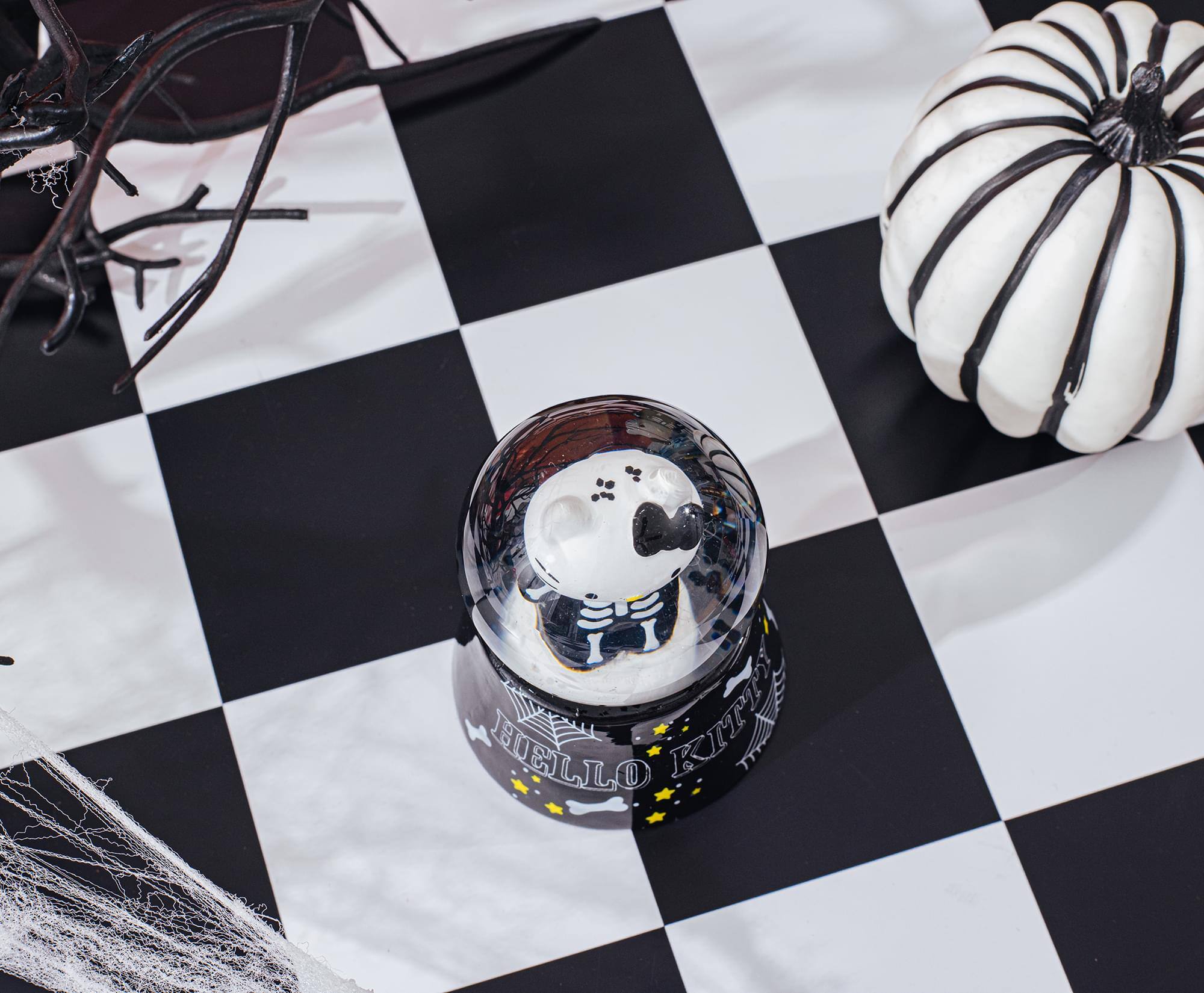 Silver Buffalo Sanrio Hello Kitty Black Skeleton Mini Light Up Snow ...